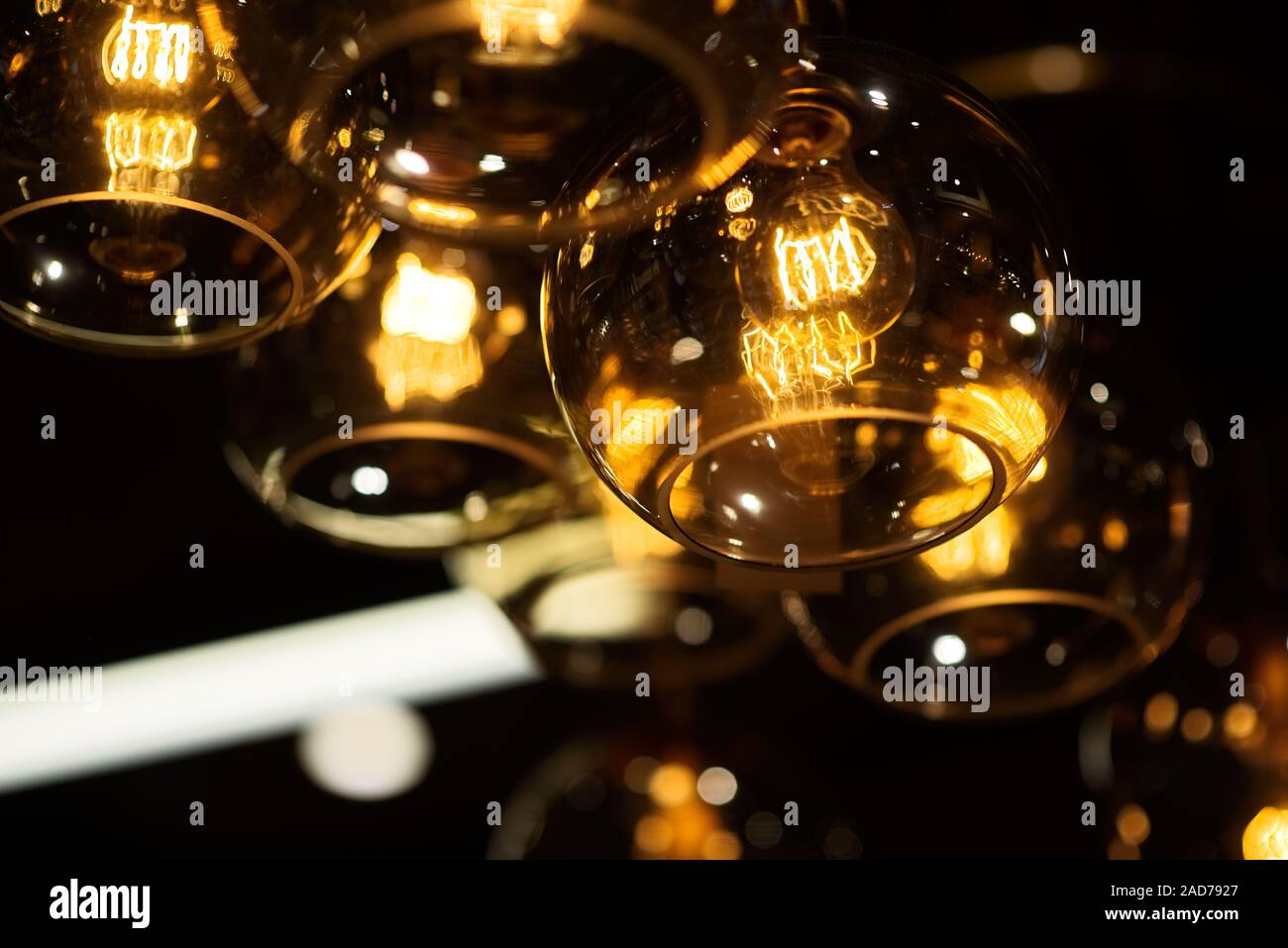 Decorative mason jar style yellow light bulbs Stock Photo - Alamy