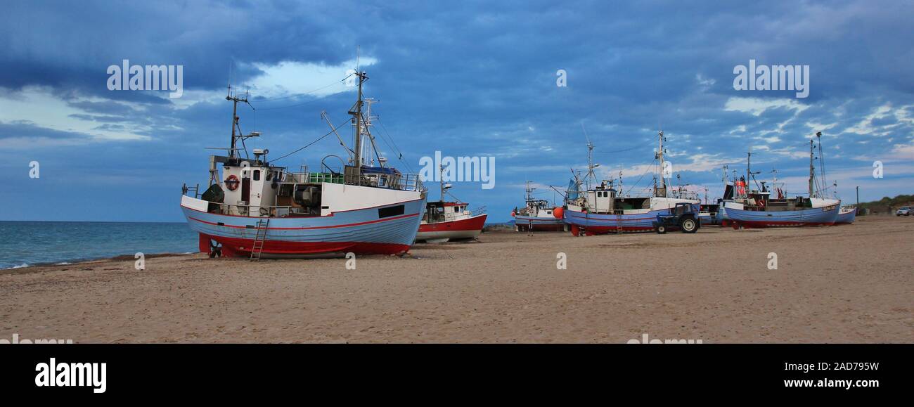 Fishing boats at Thorup Strand, Jylland. Cloudy summer evening in ...