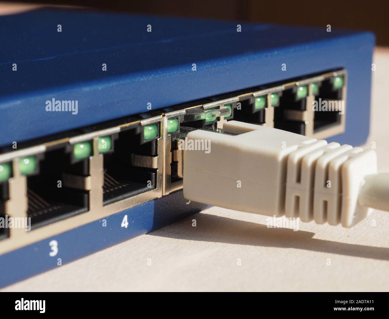 Modem router switch with RJ45 ethernet plug ports Stock Photo - Alamy