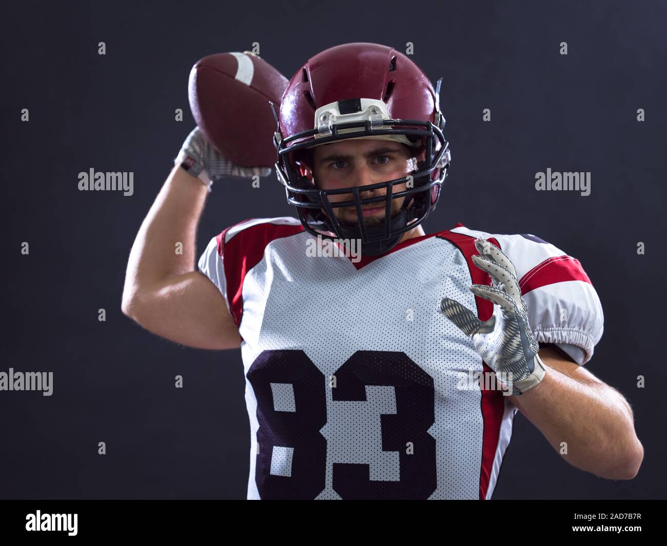 american football player throwing ball Stock Photo - Alamy