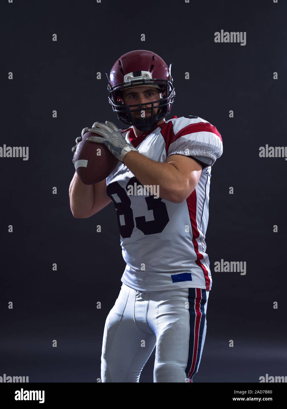 american football player throwing ball Stock Photo - Alamy
