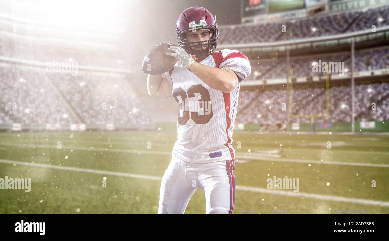 american football player throwing ball Stock Photo - Alamy