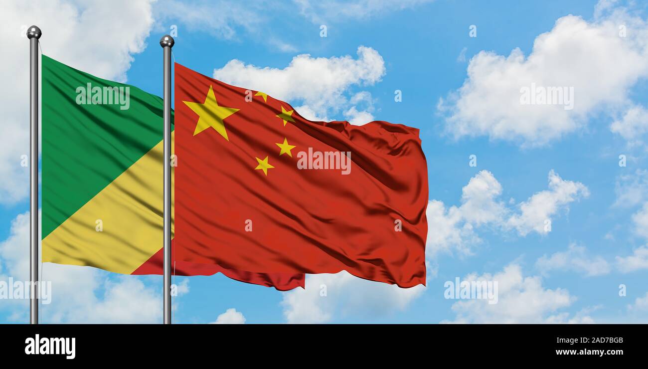 Republic Of The Congo and China flag waving in the wind against white ...
