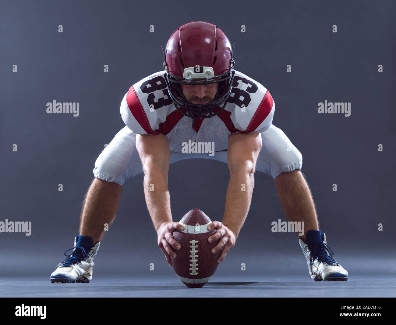 American football player getting ready before starting Stock Photo - Alamy