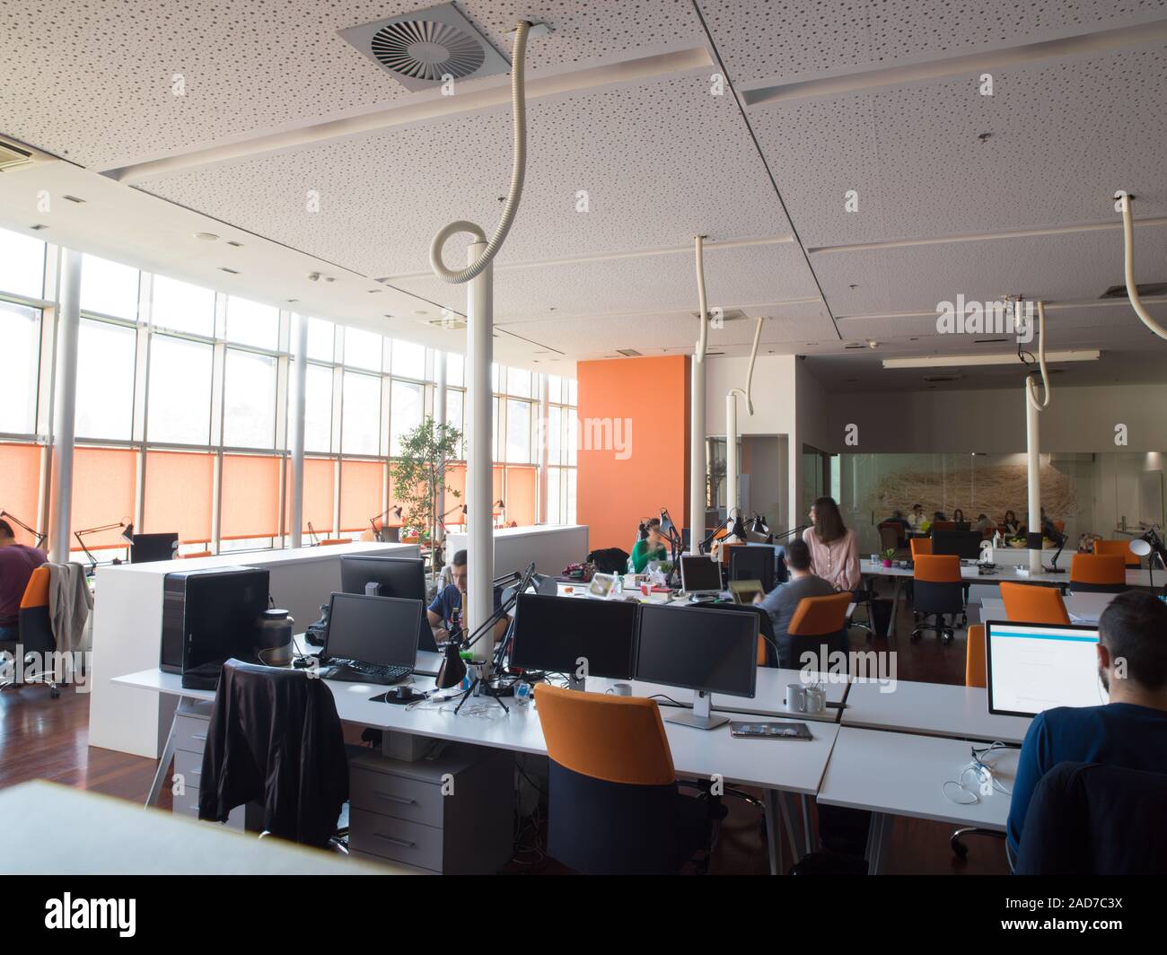 busy coworking office space Stock Photo - Alamy
