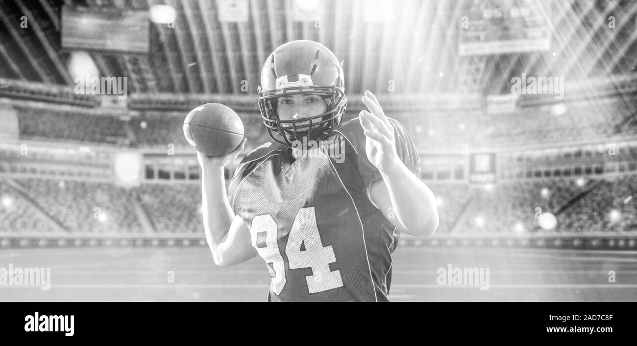 american football player throwing ball Stock Photo - Alamy