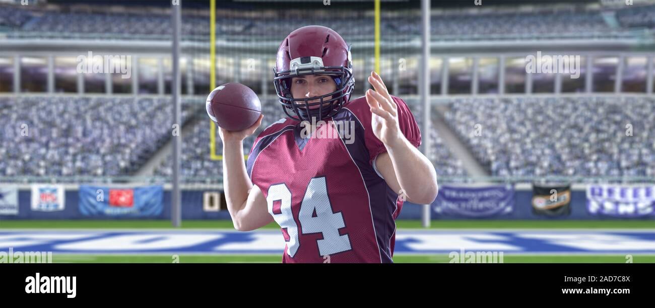 american football player throwing ball Stock Photo - Alamy