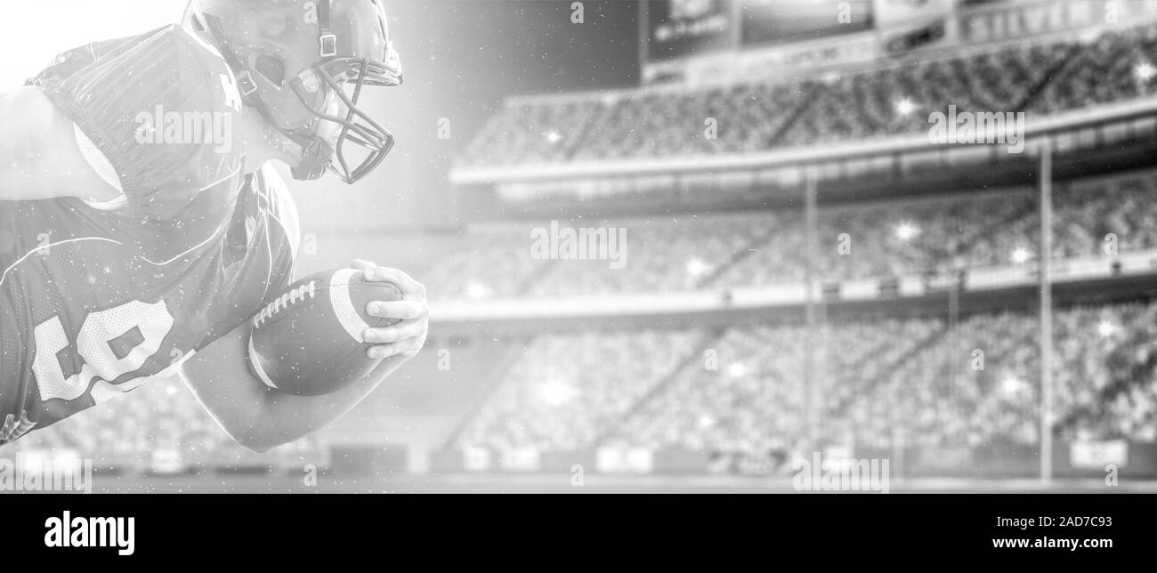 American football Player running with the ball Stock Photo - Alamy