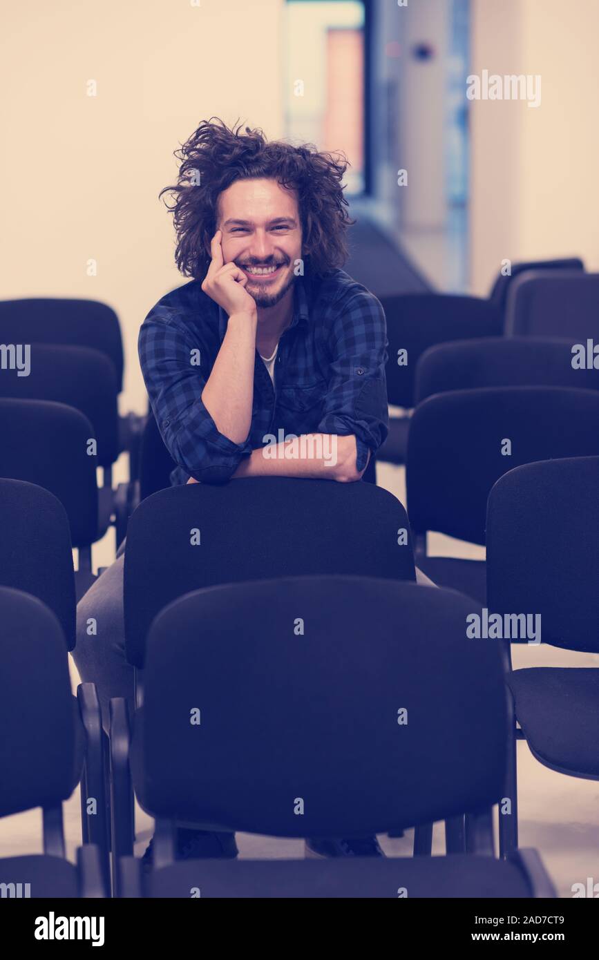 A student sits alone in a classroom Stock Photo - Alamy