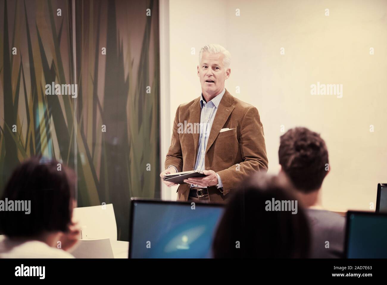 teacher and students in computer lab classroom Stock Photo - Alamy
