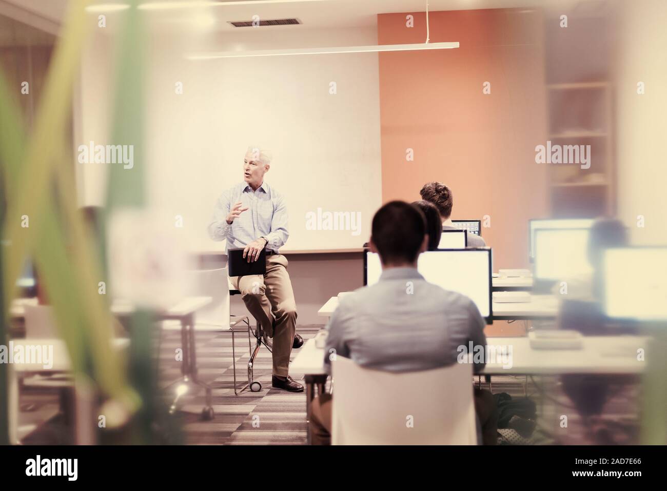 teacher and students in computer lab classroom Stock Photo - Alamy