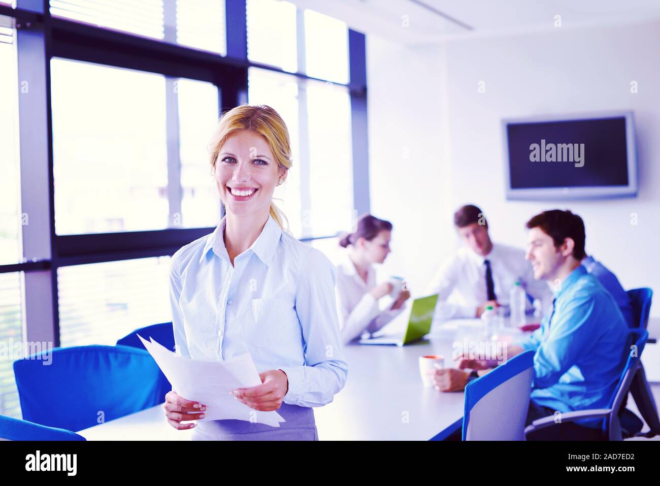 Business woman her staff hi-res stock photography and images - Alamy