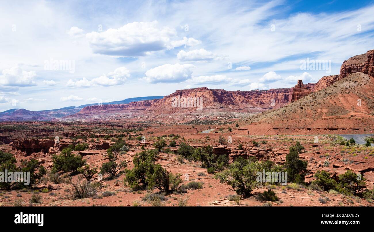 The red cliffs of Capitol Reef lie below a cloudy desert sky Stock ...