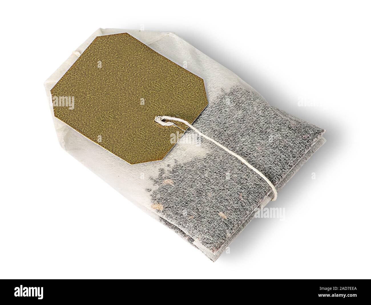Single tea bag lying Stock Photo - Alamy