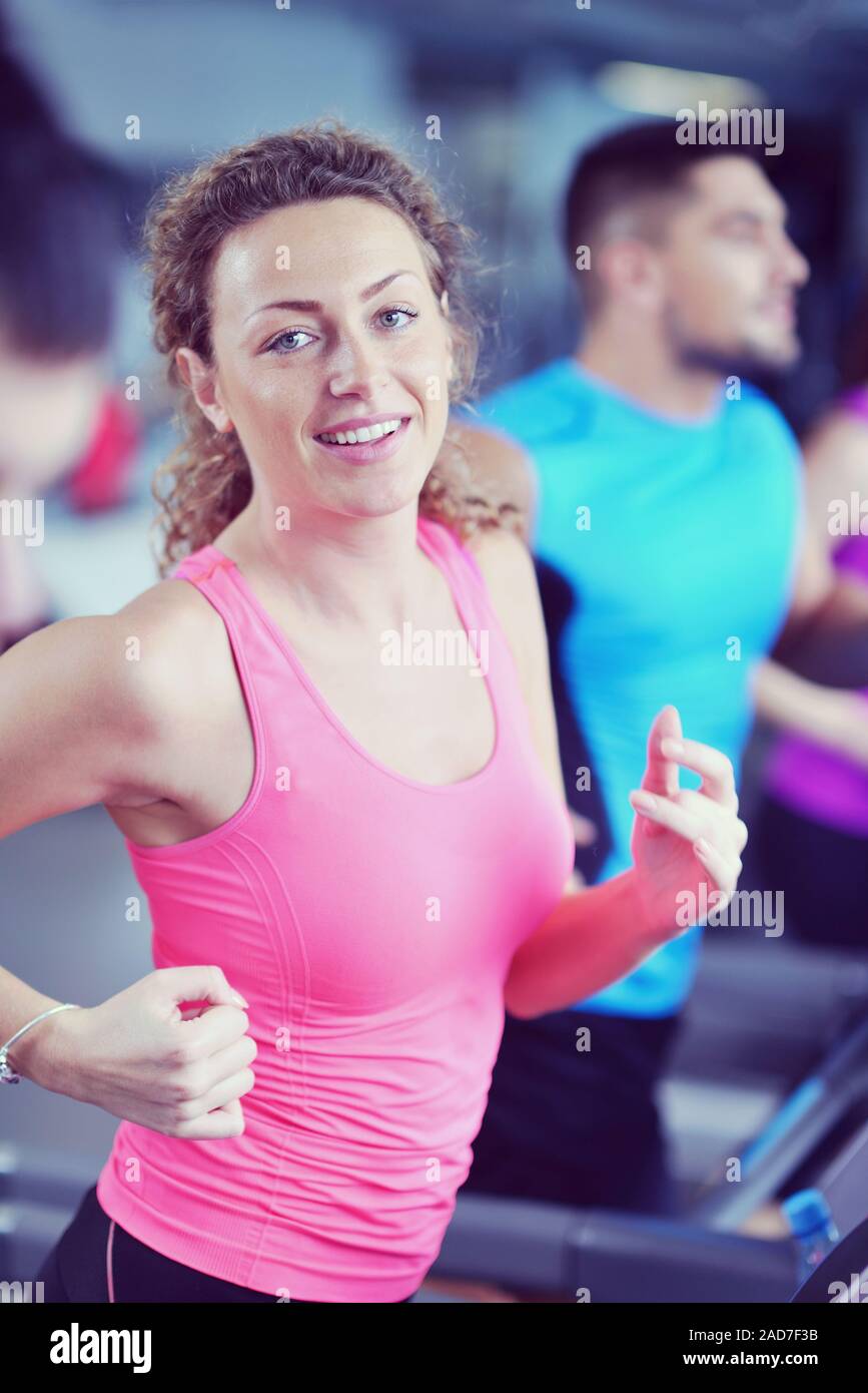 Woman exercising on treadmill in hi-res stock photography and images ...