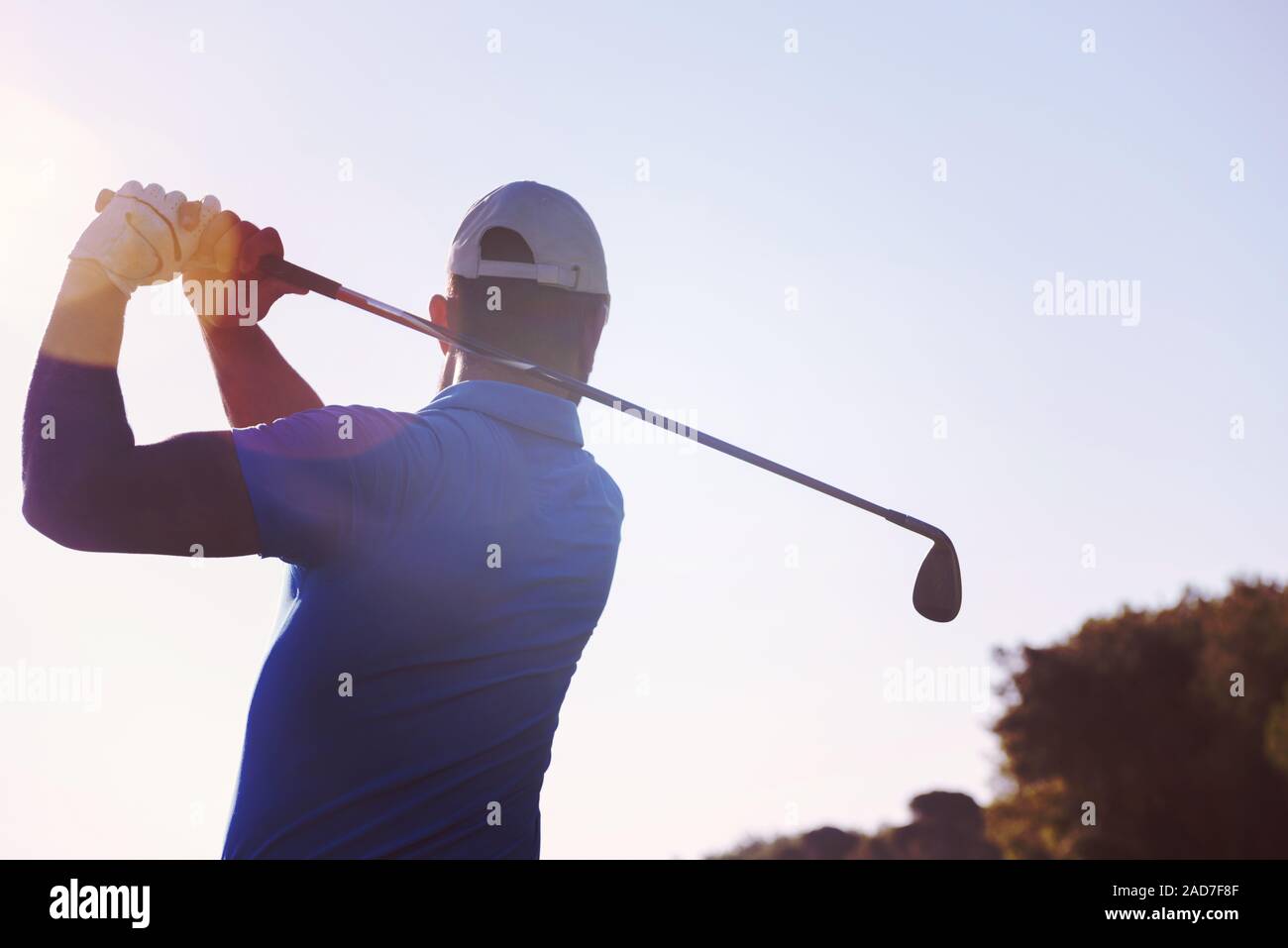 golf player hitting shot Stock Photo - Alamy