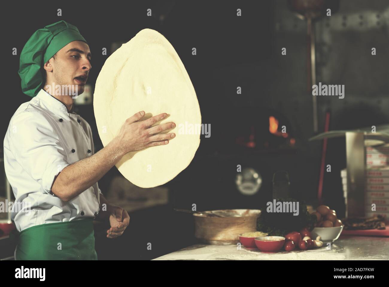 Throwing pizza dough up hi-res stock photography and images - Alamy