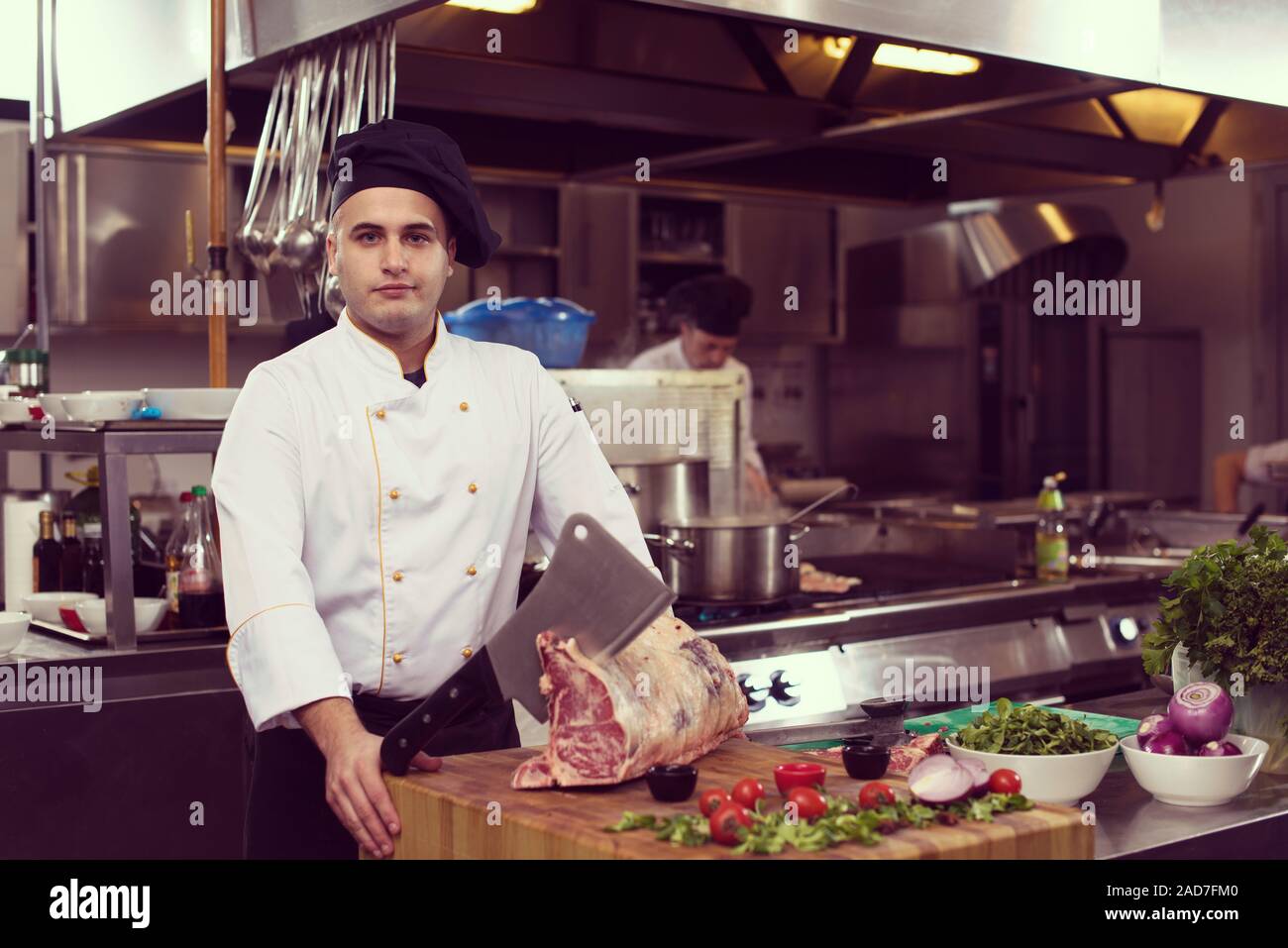 chef cutting big piece of beef Stock Photo - Alamy