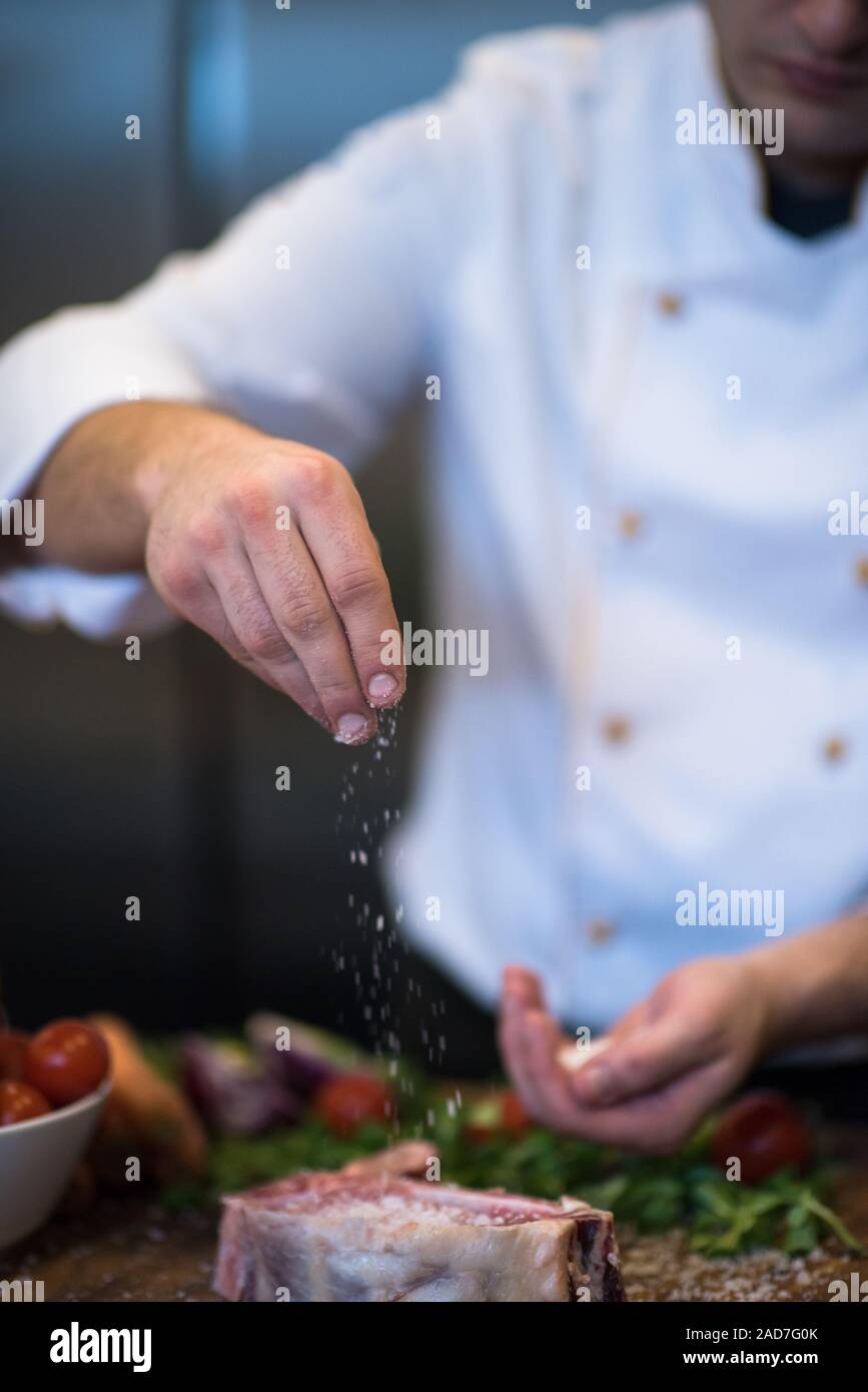 Master chef hands putting hi-res stock photography and images - Alamy
