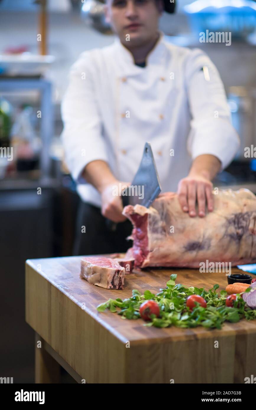chef cutting big piece of beef Stock Photo - Alamy