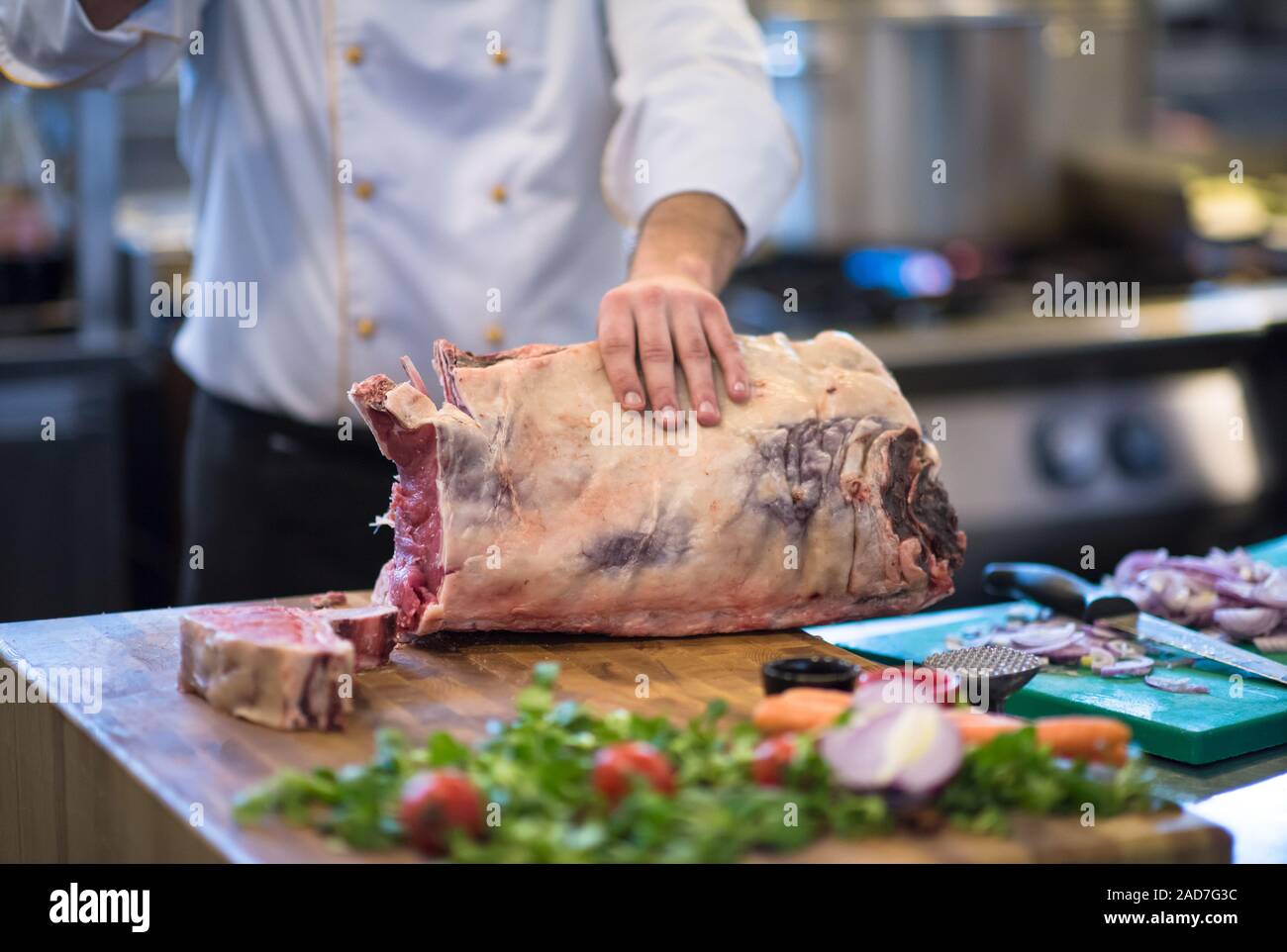 chef cutting big piece of beef Stock Photo - Alamy