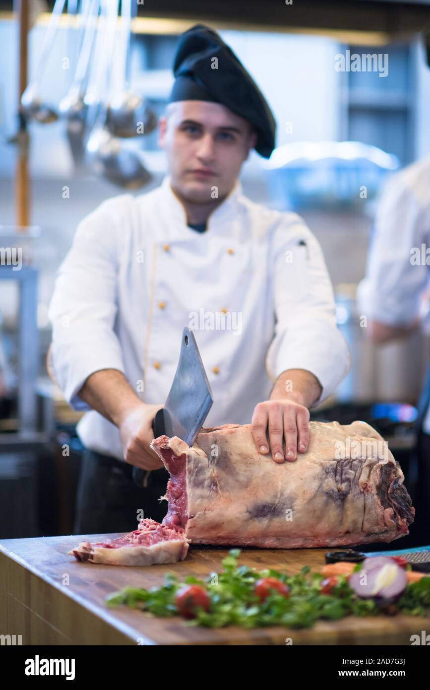 chef cutting big piece of beef Stock Photo - Alamy