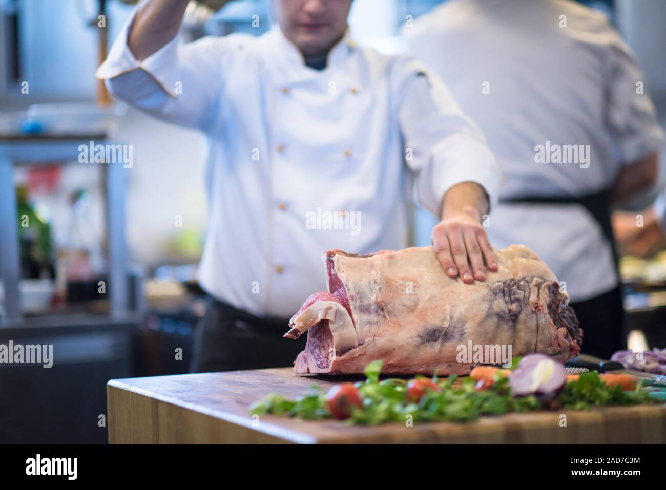 chef cutting big piece of beef Stock Photo - Alamy