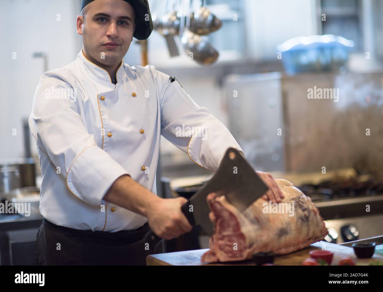 chef cutting big piece of beef Stock Photo - Alamy