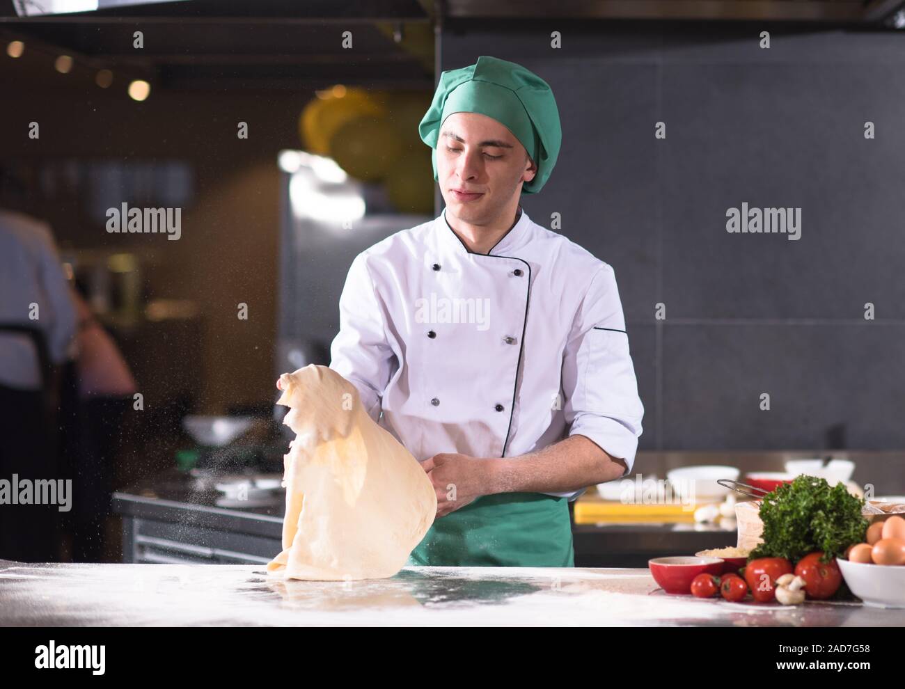 chef throwing up pizza dough Stock Photo - Alamy