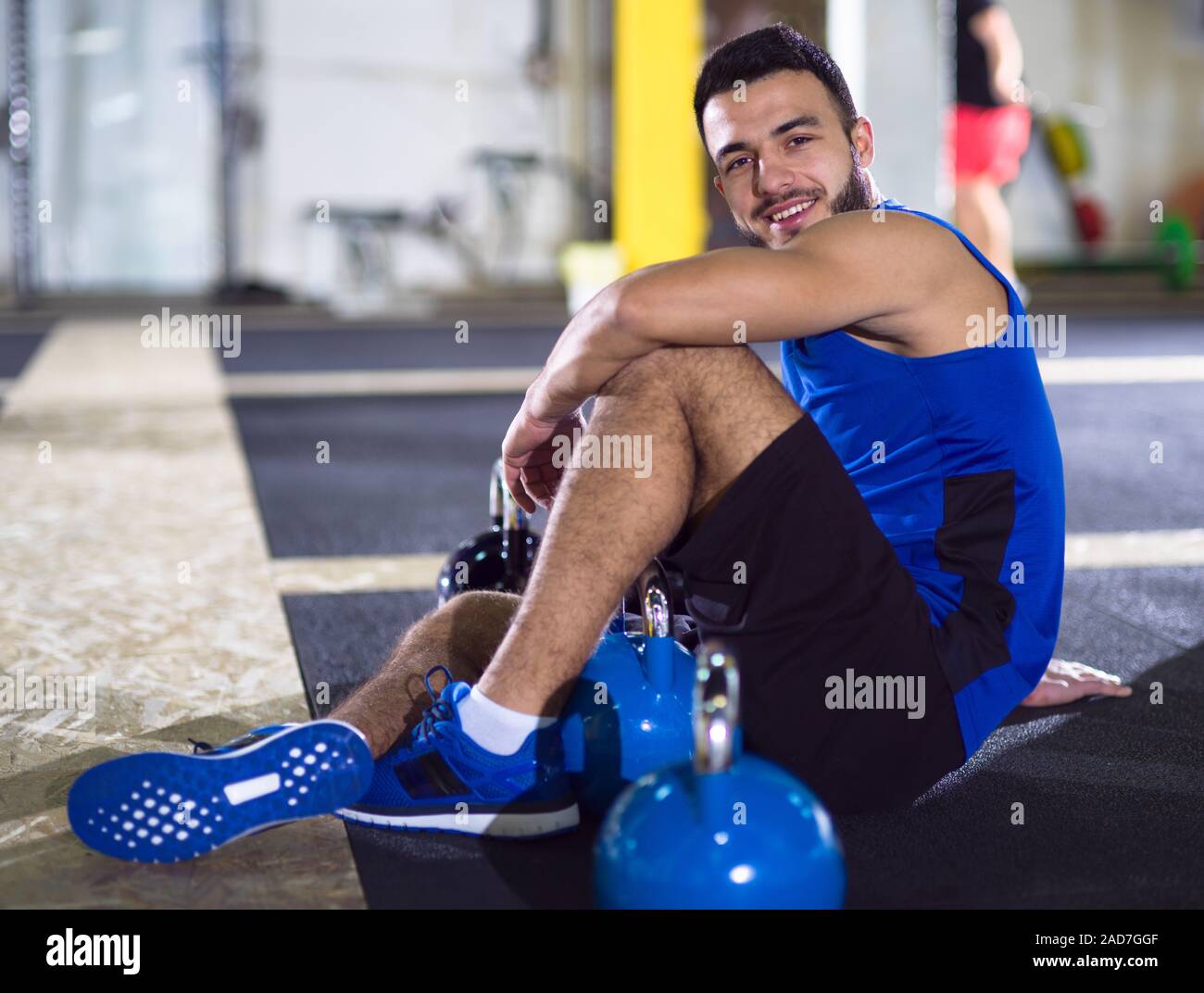 Man sitting floor muscles hi-res stock photography and images - Alamy