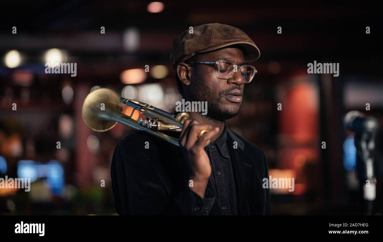 Mark Kavuma with his trumpet Stock Photo - Alamy