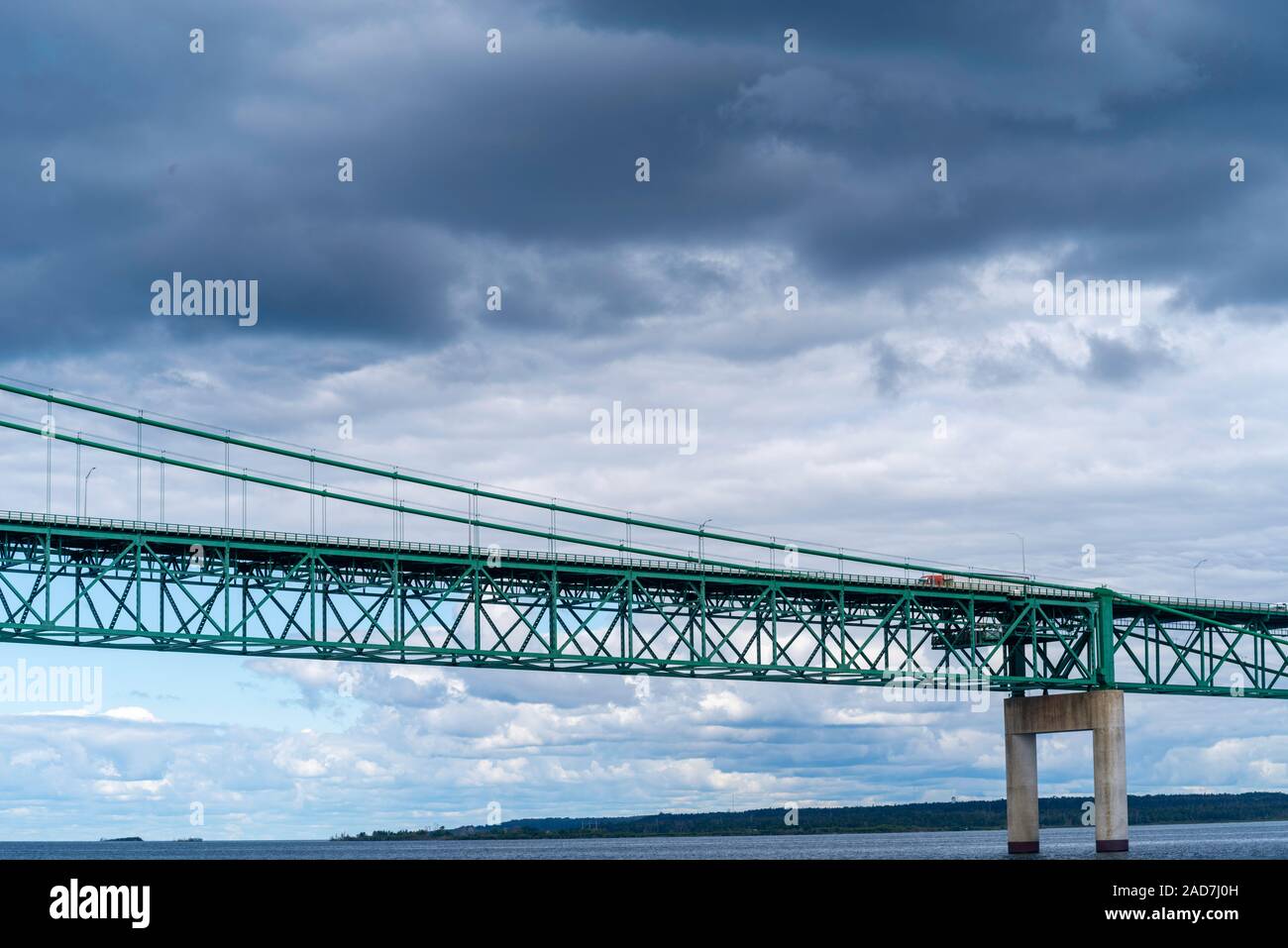 View of the Mackinac Bridge from a boat on Lake Huron; St. Ignace ...