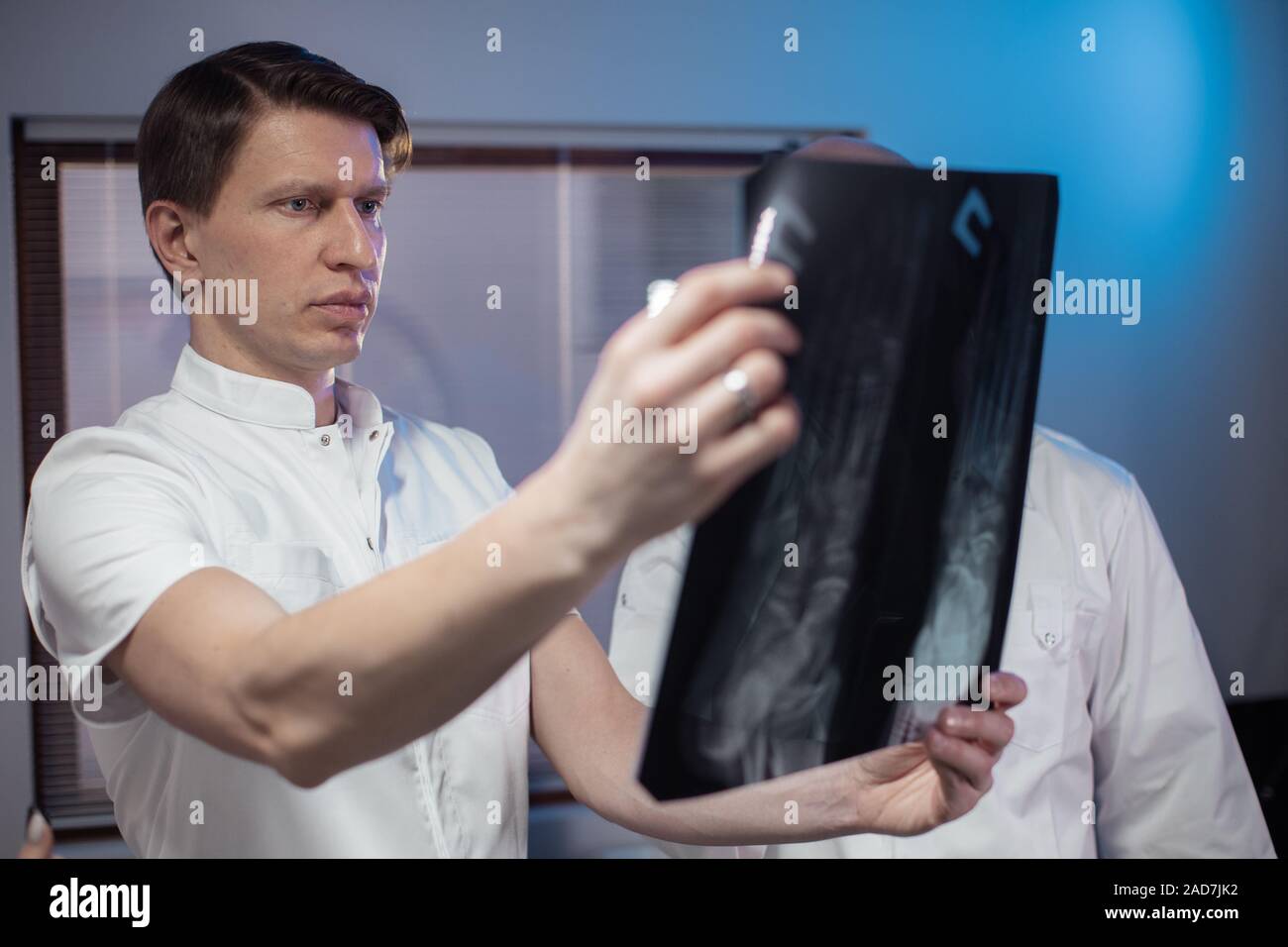 Medical doctors look x ray hospital hi-res stock photography and images ...