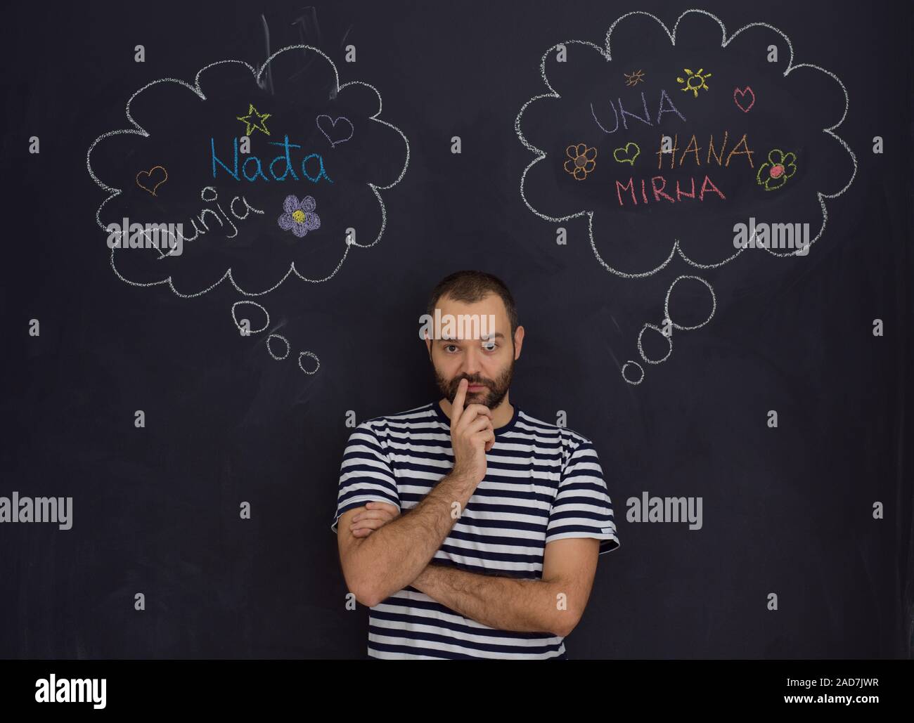 young future father thinking in front of black chalkboard Stock Photo ...