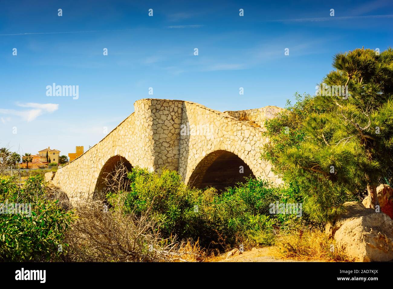 An ancient stone bridge at Spain, blue sky Stock Photo - Alamy