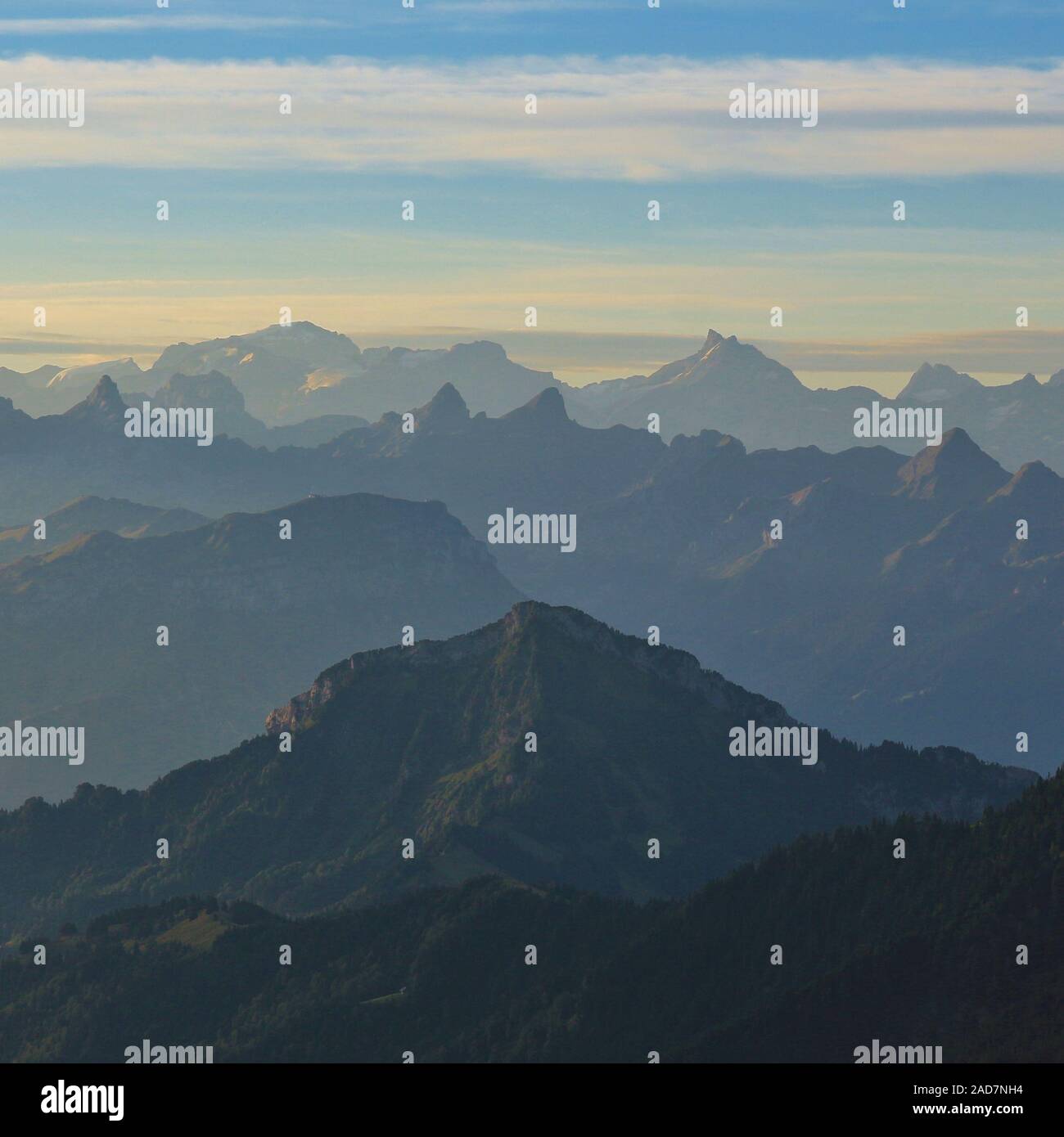 Mountain ranges in Switzerland at sunrise. Distant view of Mount Santis ...