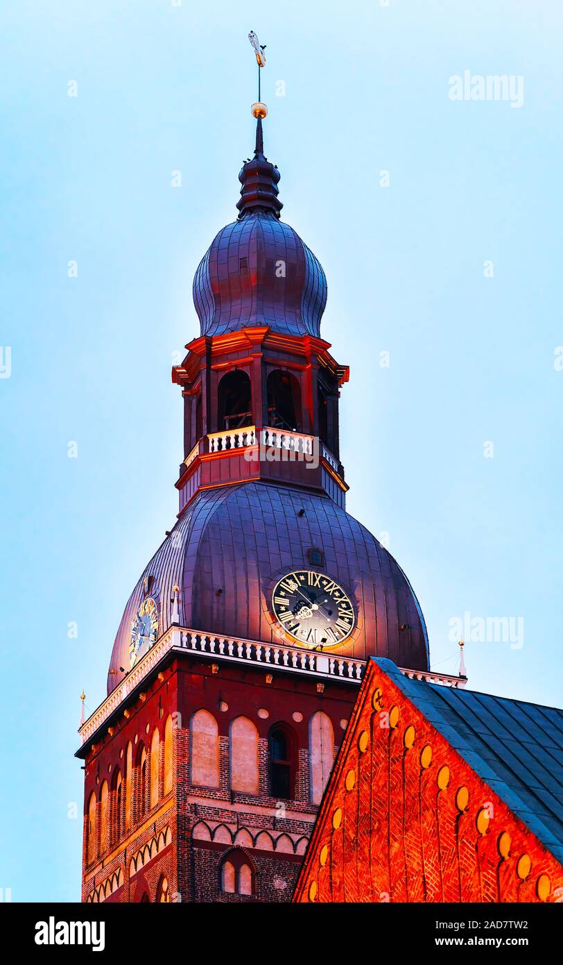 Clock tower of Dome Cathedral Riga Old Town reflex Stock Photo - Alamy