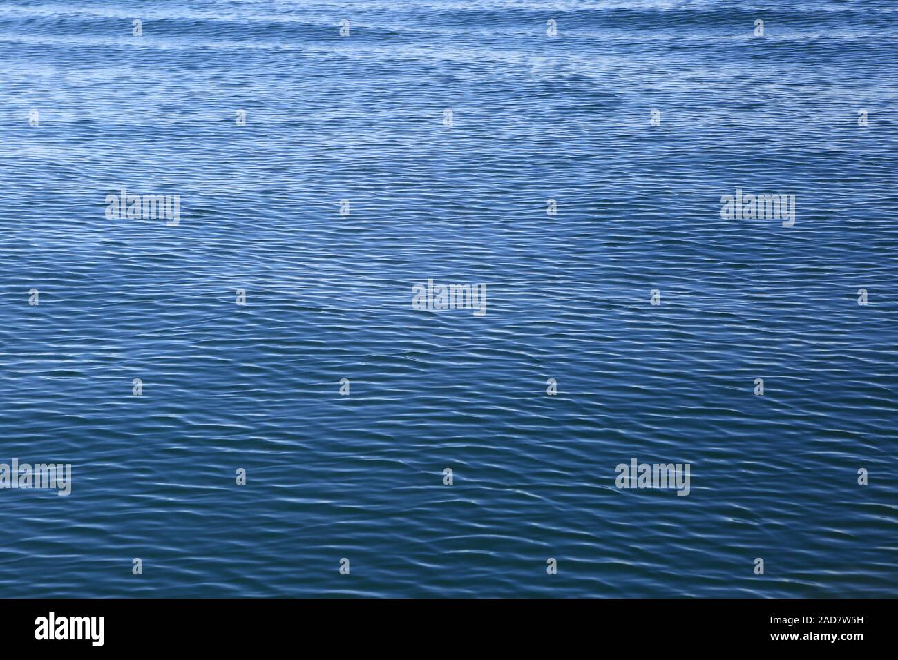 Moving water surface with waves Stock Photo - Alamy