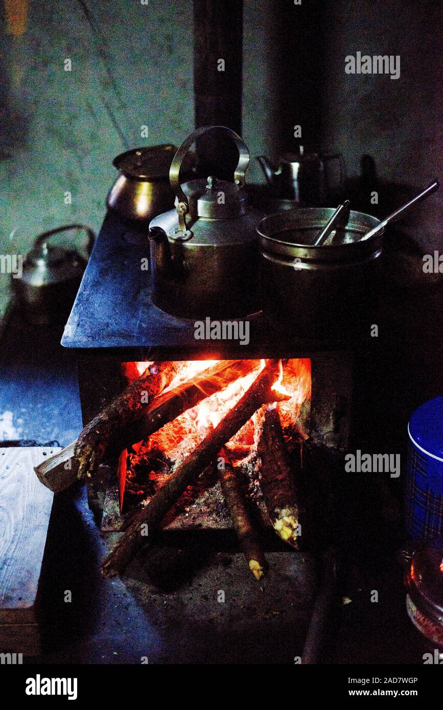 Cooking on a wood fire stove, Gyabla,Taplejung District, Nepal Stock ...