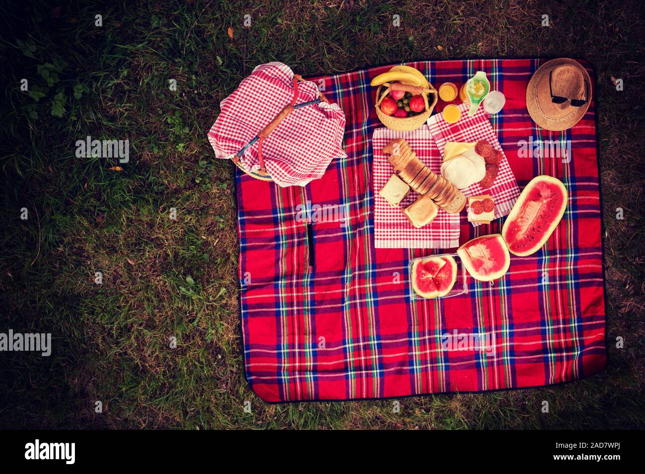 top view of picnic blanket setting on the grass Stock Photo - Alamy