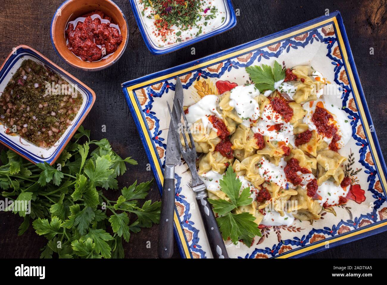 Traditional Turk manti steamed with mincemeat and paprika tomato salad ...
