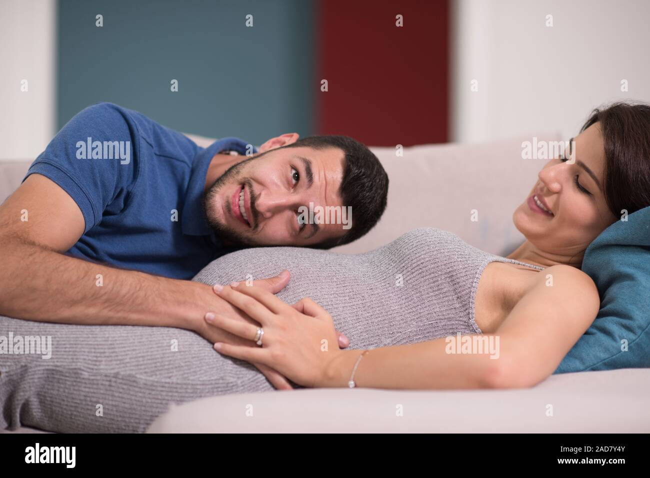 future dad listening the belly of his pregnant wife Stock Photo - Alamy