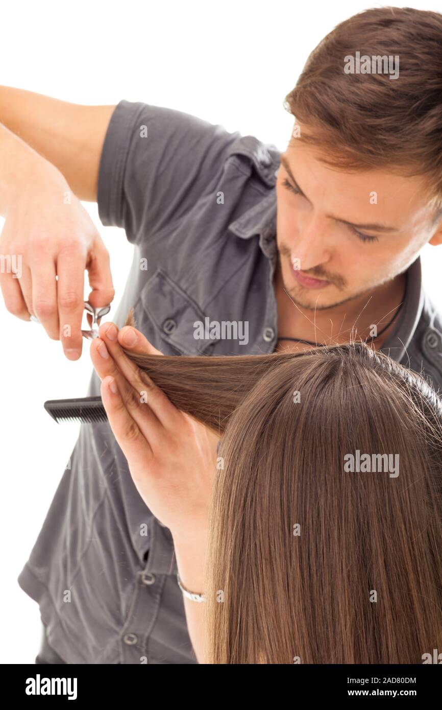 Professional hairdresser with long hair model, isolated on white Stock ...