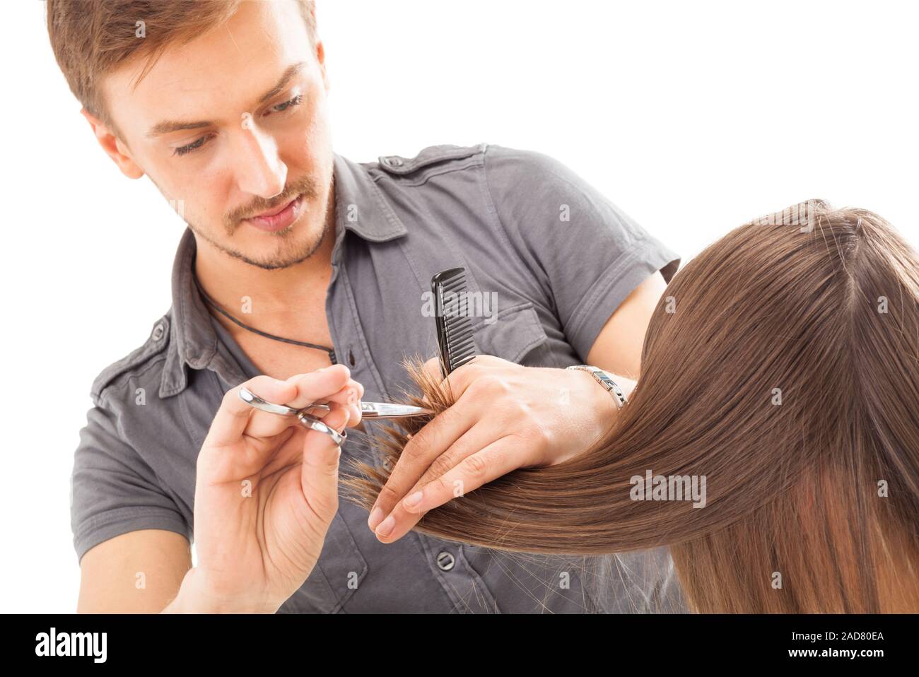 Professional hairdresser with long hair model, isolated on white Stock ...
