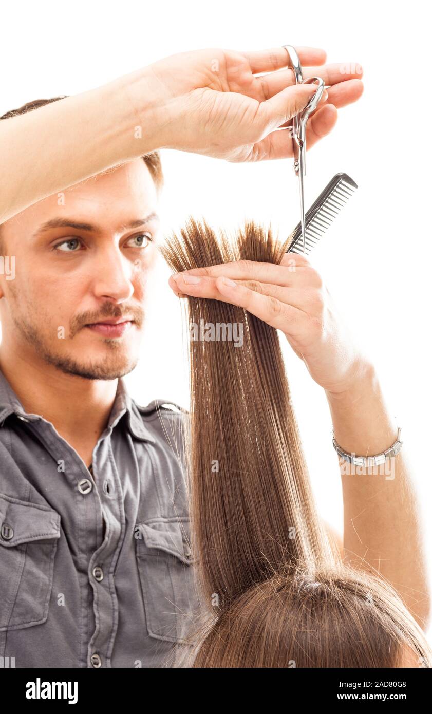 Professional hairdresser with long hair model, isolated on white Stock ...