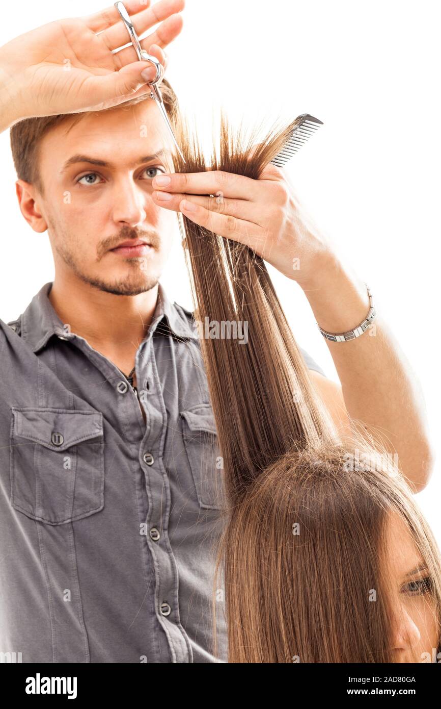 Professional hairdresser with long hair model, isolated on white Stock ...