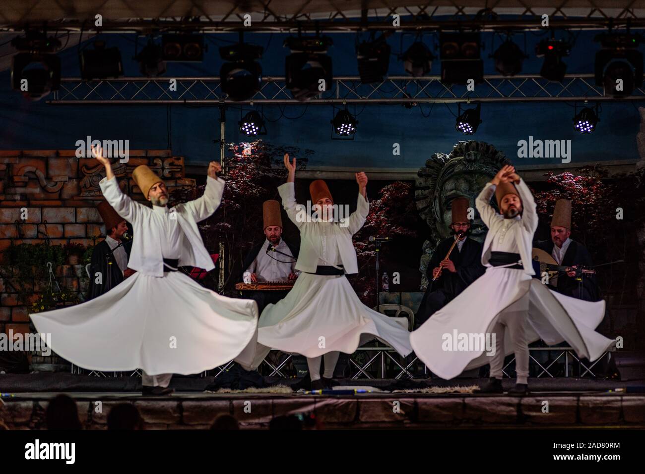 The Turkish whirling dancers or Sufi whirling dancers performing of the ...