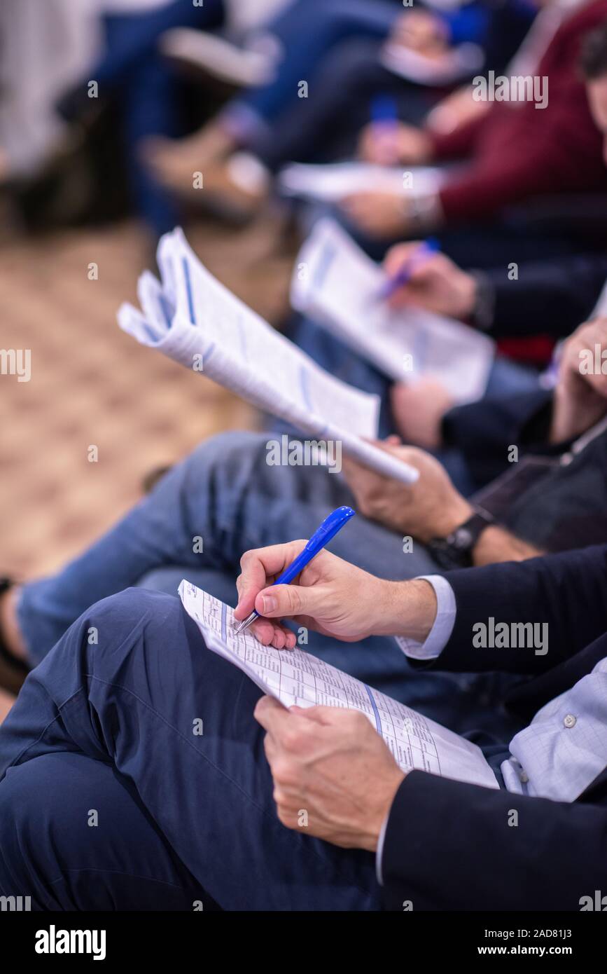 Business people taking notes Stock Photo - Alamy