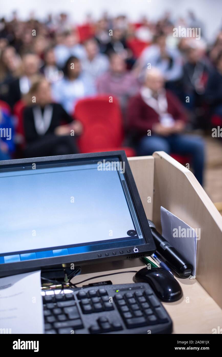 laptop computer at podium Stock Photo - Alamy