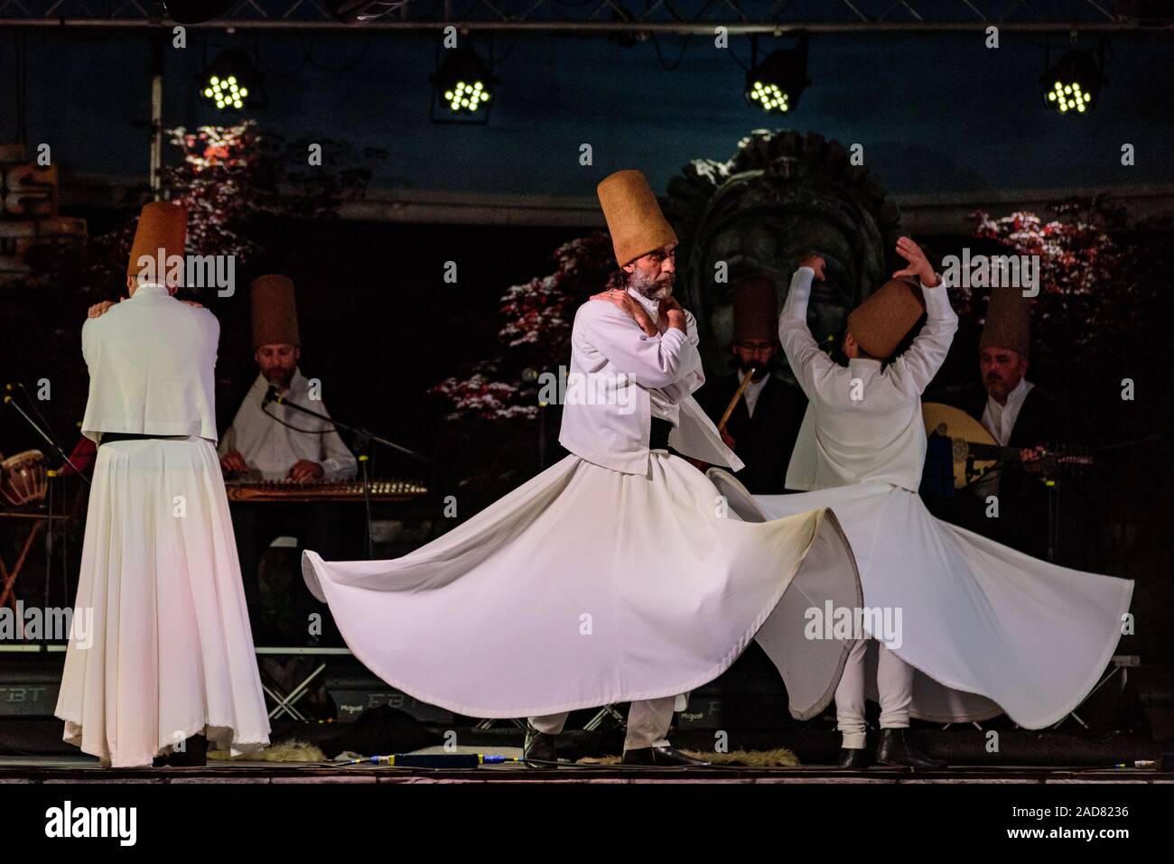 The Turkish whirling dancers or Sufi whirling dancers performing of the ...